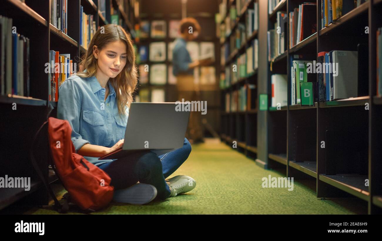 University Library: Gifted Beautiful Caucasian Girl Sitting On Floor ...