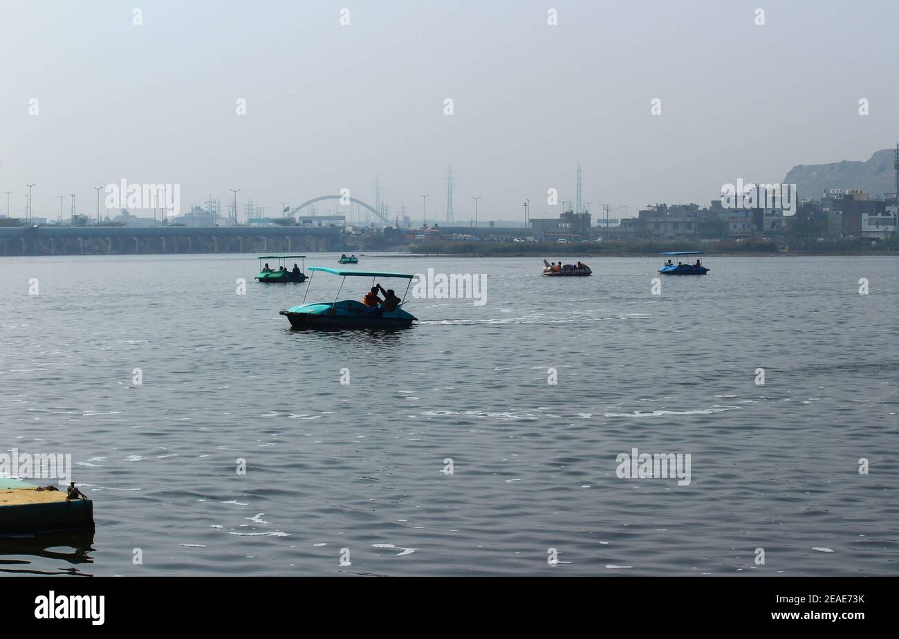 People enjoying boating in Bhalswa Horseshoe Lake in Delhi India during ...