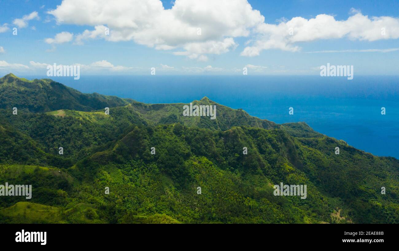 Mountain landscape on tropical island with with blue sea, mountain ...