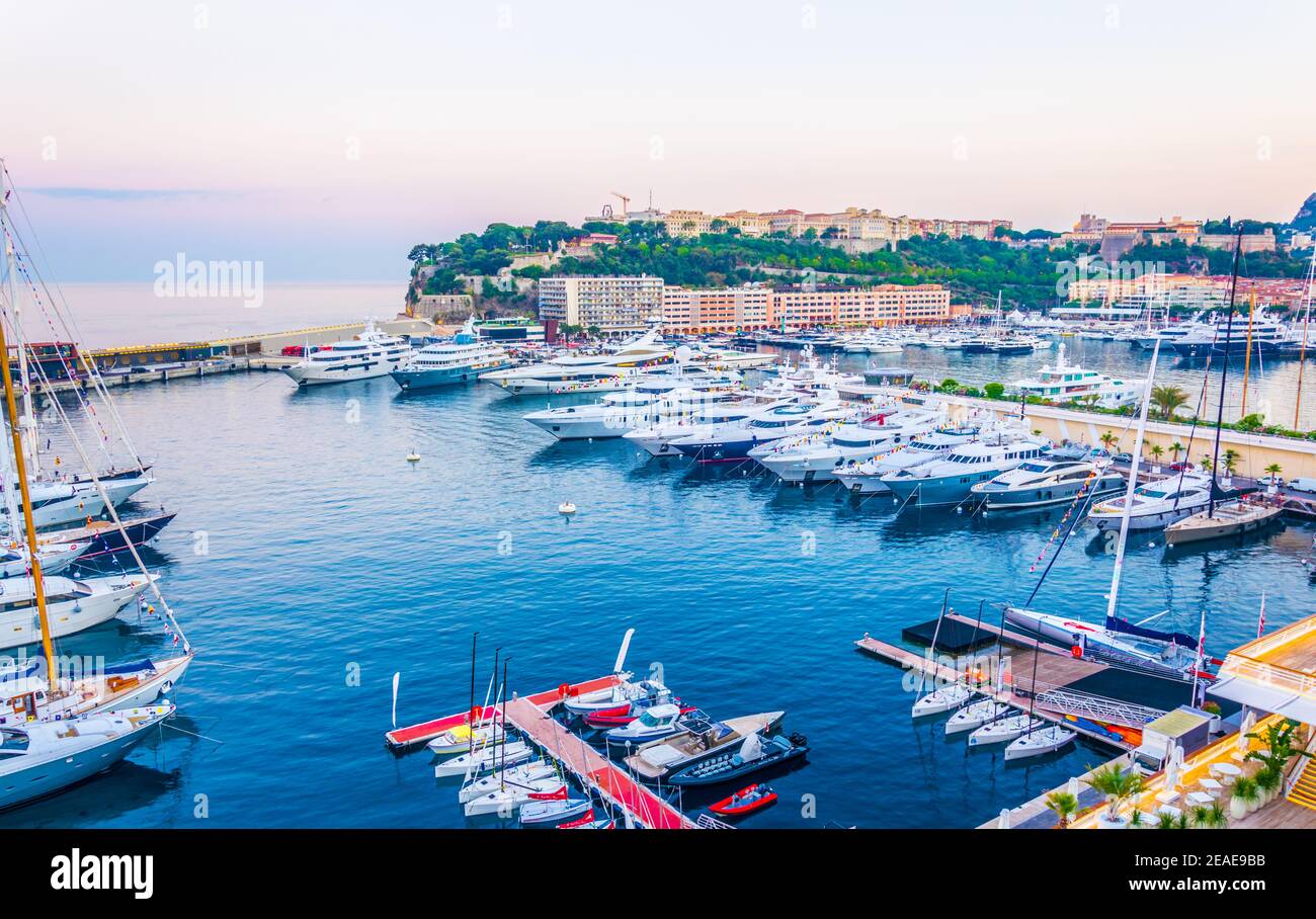 Old town of Monaco overlooking port Hercule during sunset Stock Photo ...
