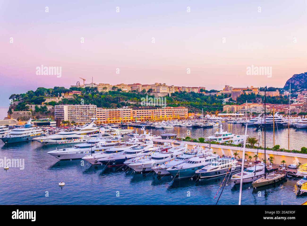 Old town of Monaco overlooking port Hercule during sunset Stock Photo ...