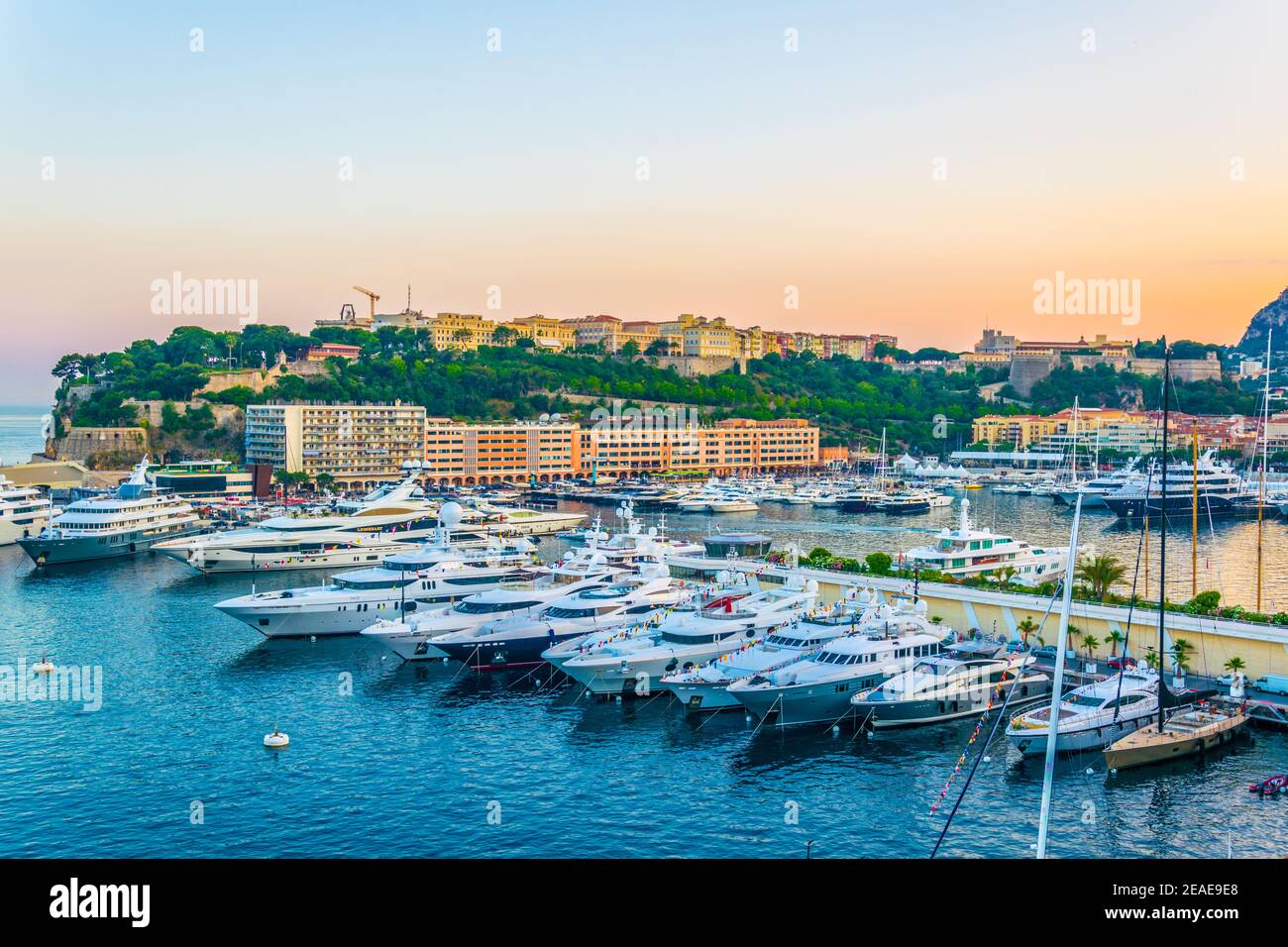 Old town of Monaco overlooking port Hercule during sunset Stock Photo ...