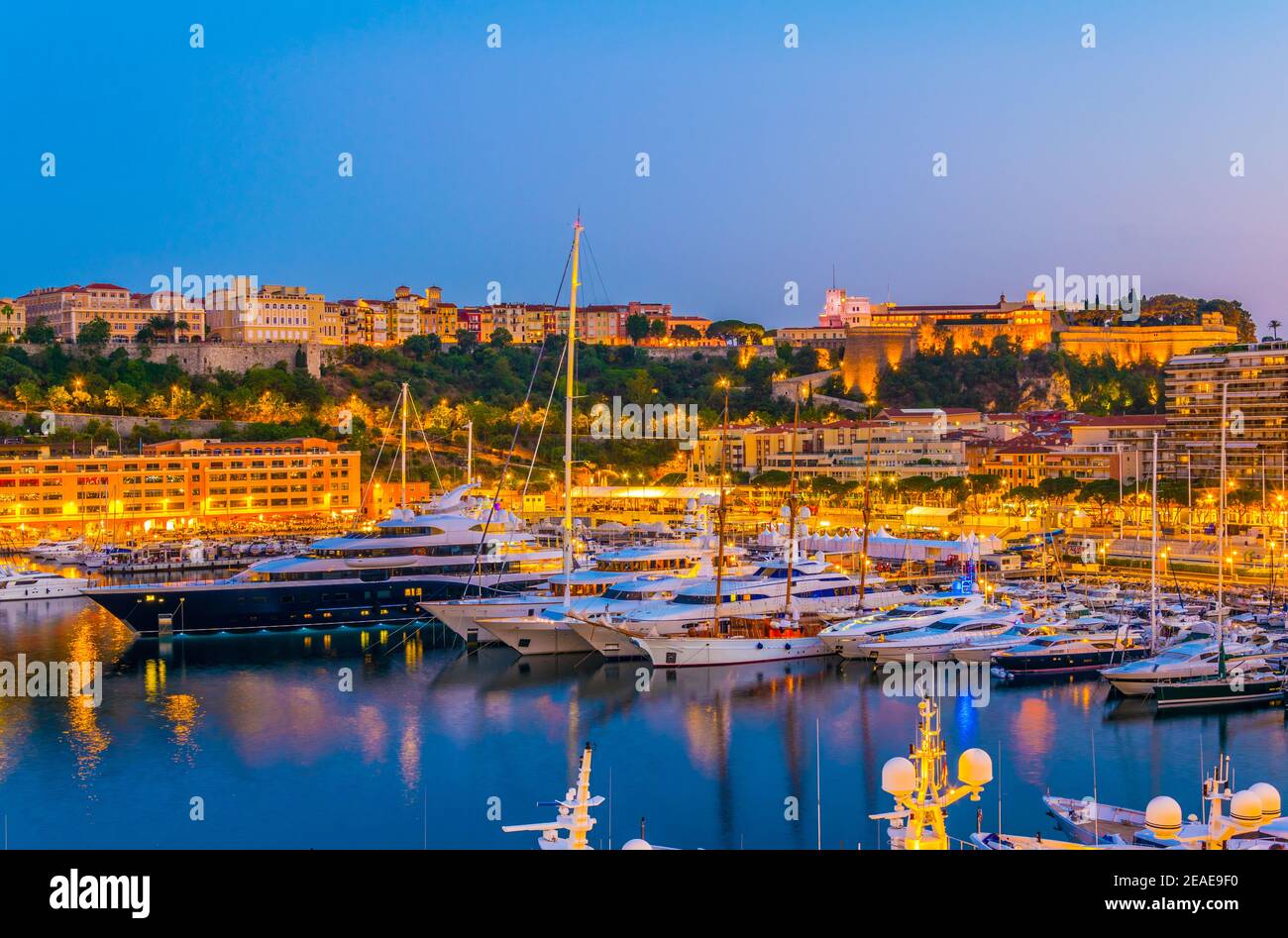 Old town of Monaco overlooking port Hercule during sunset Stock Photo ...