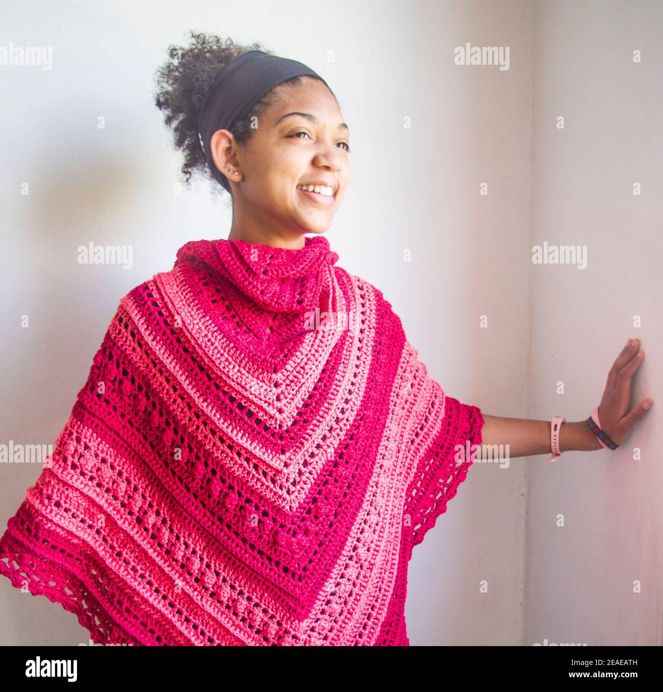 Red green knitted poncho hi-res stock photography and images - Alamy