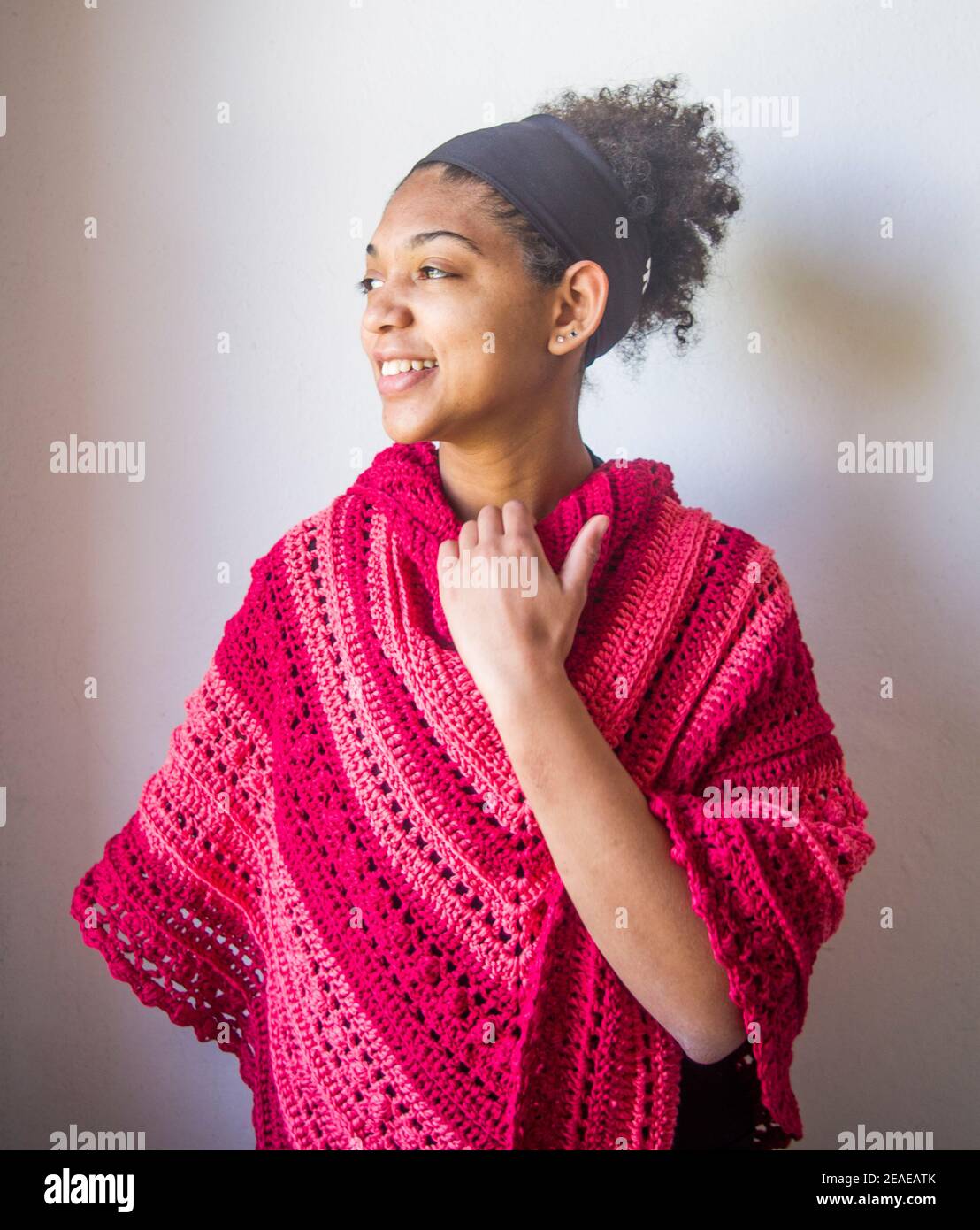 Red green knitted poncho hi-res stock photography and images - Alamy