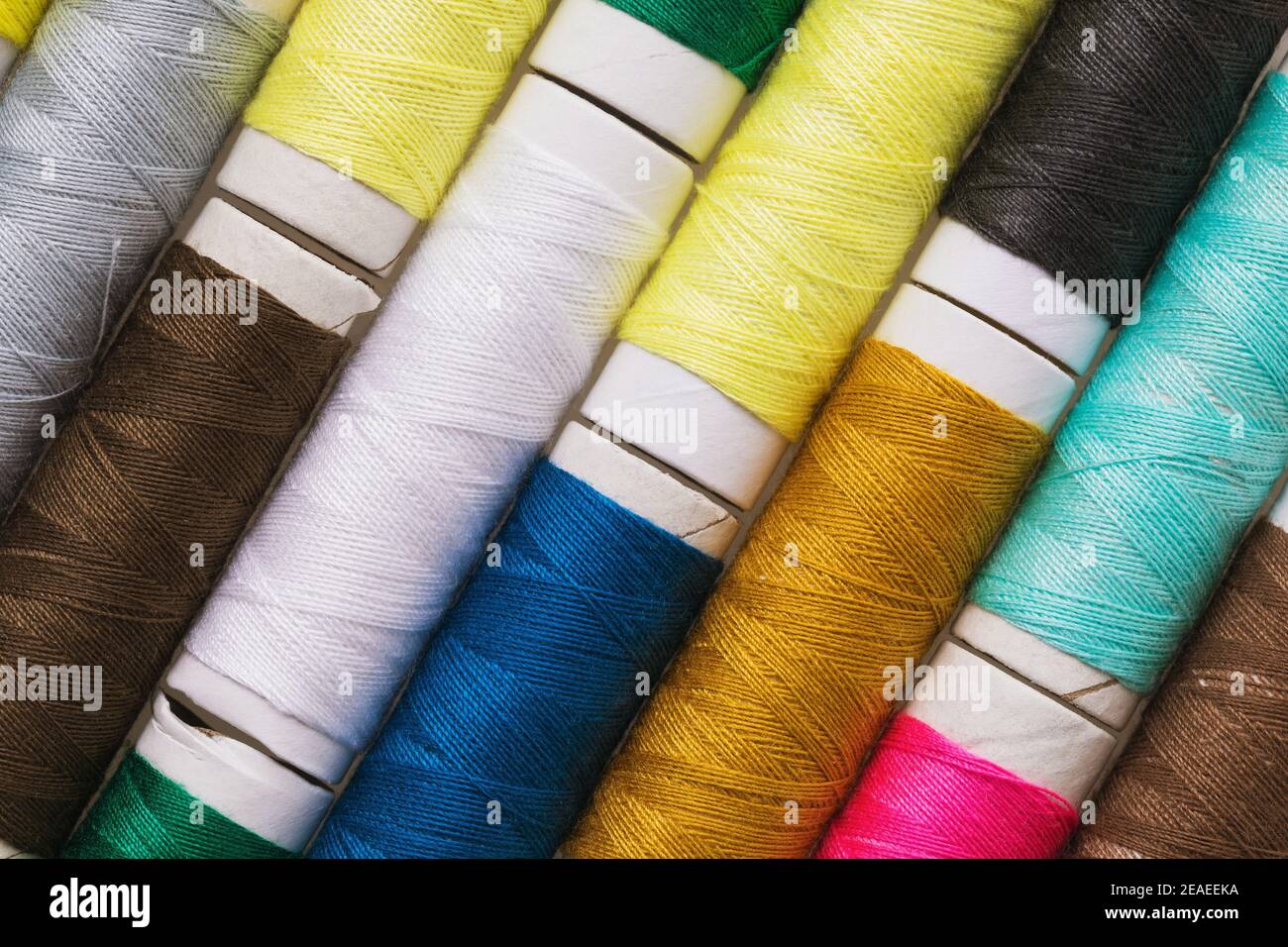 Multi colored threads hi-res stock photography and images - Alamy