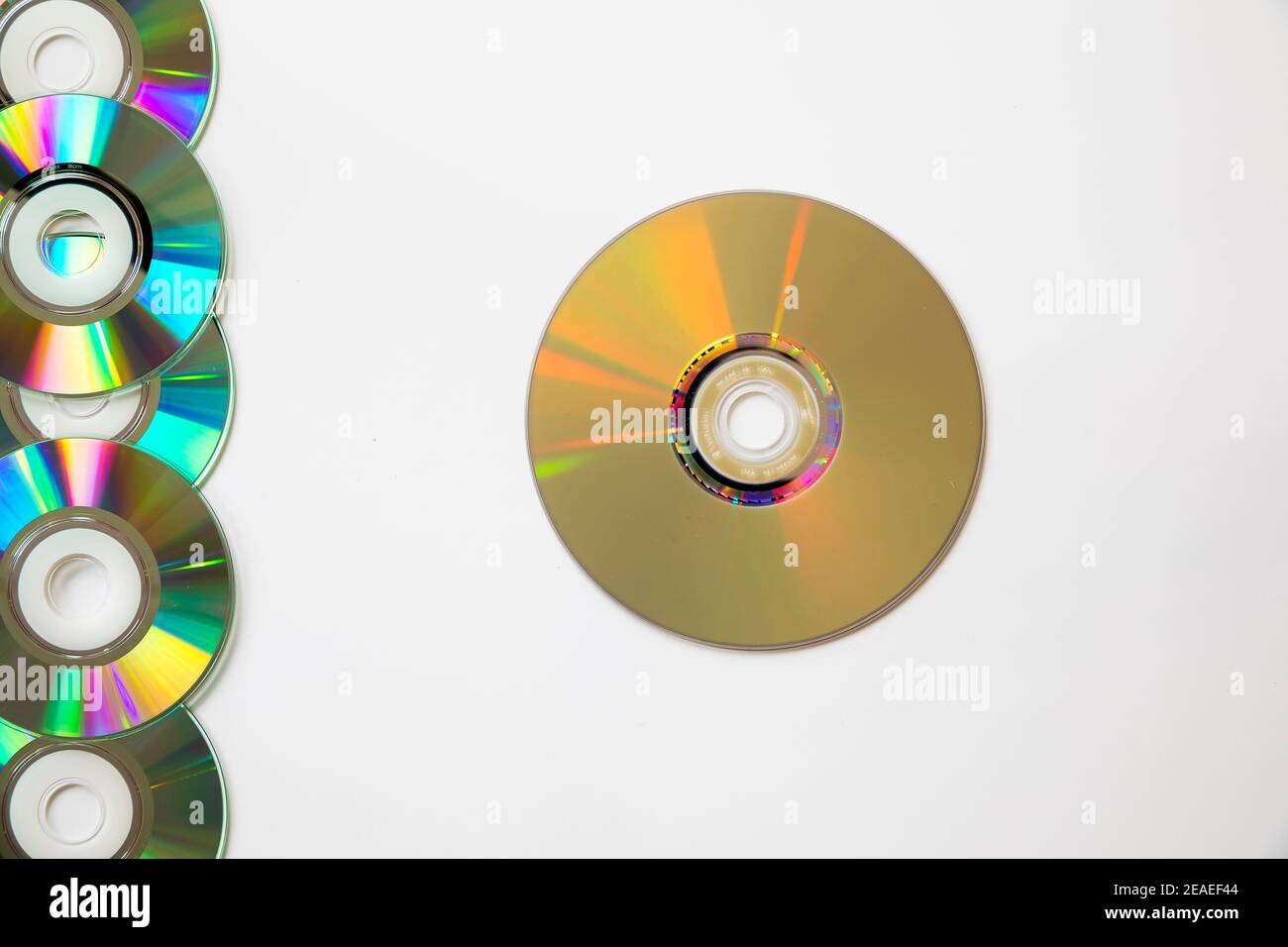 Stacked dvds isolated on white background Stock Photo - Alamy