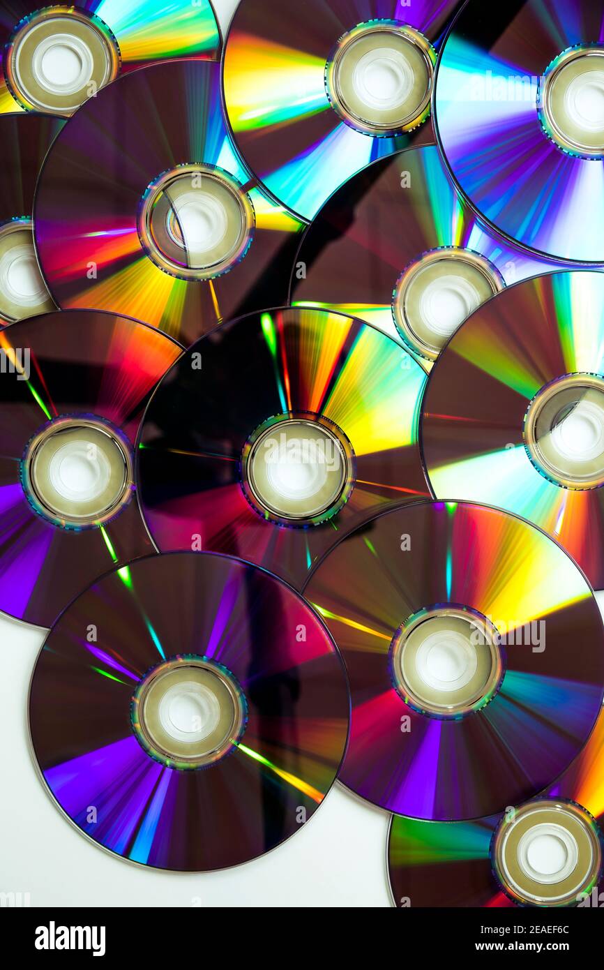 Stacked dvds isolated on white background Stock Photo - Alamy