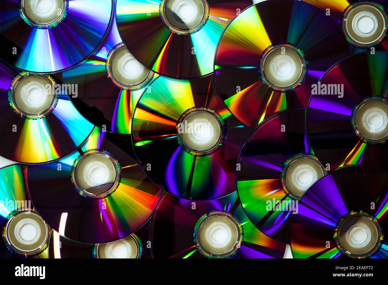 Stacked dvds isolated on white background Stock Photo - Alamy