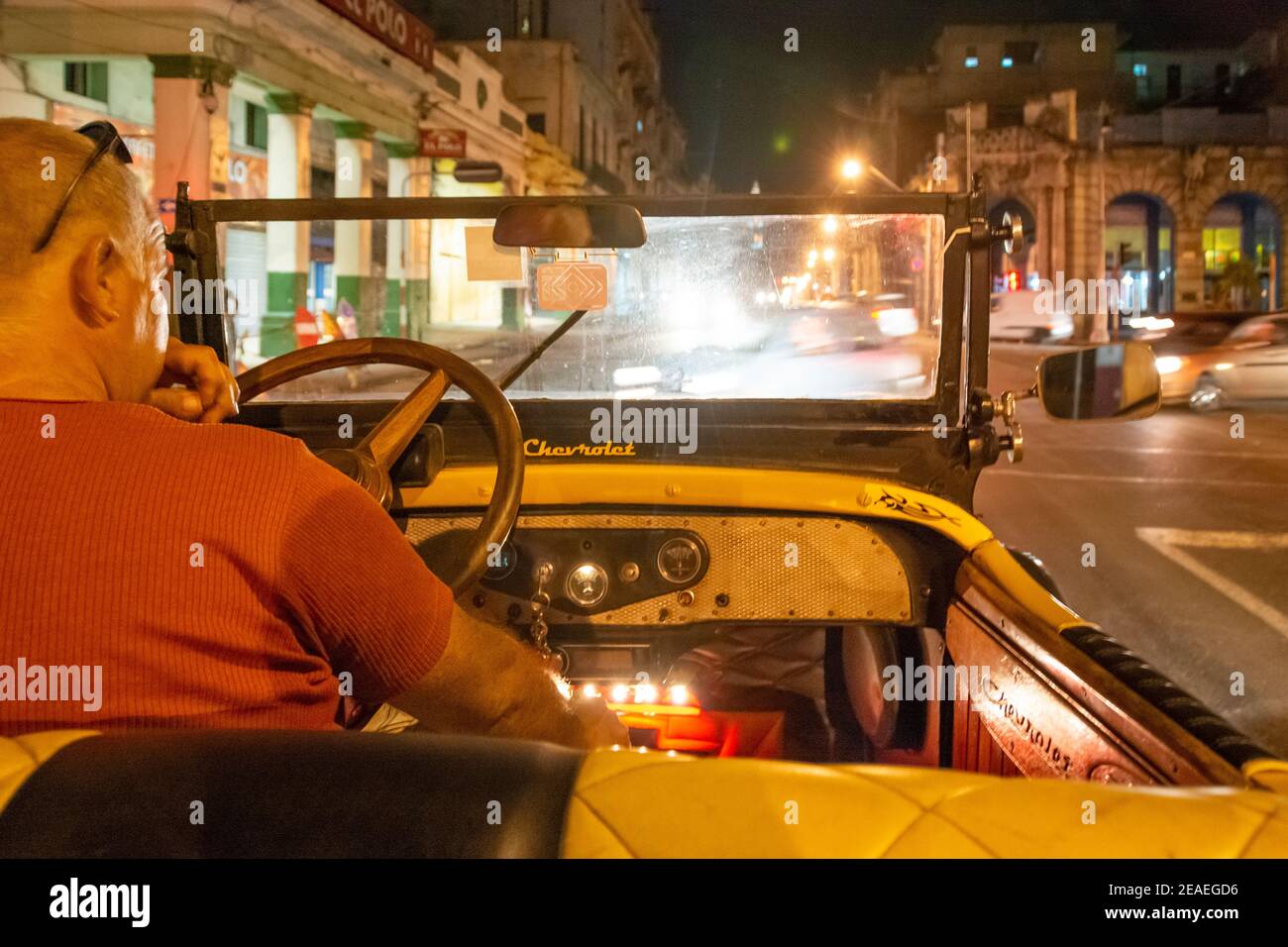Vintage convertible tourist taxi in Havana at night, Cuba Stock Photo ...