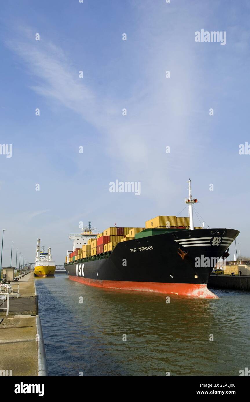 Container ship at the port of Antwerp Stock Photo - Alamy