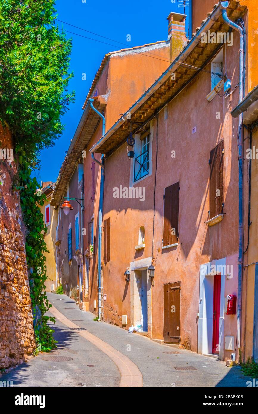 A narrow street in Roussillon village in France Stock Photo - Alamy