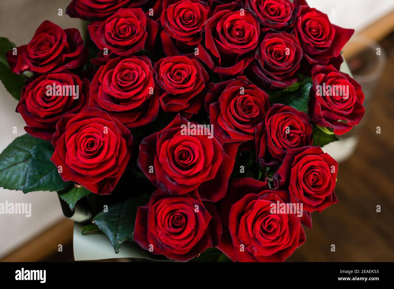 Natural red roses background, bouquet of roses Stock Photo - Alamy