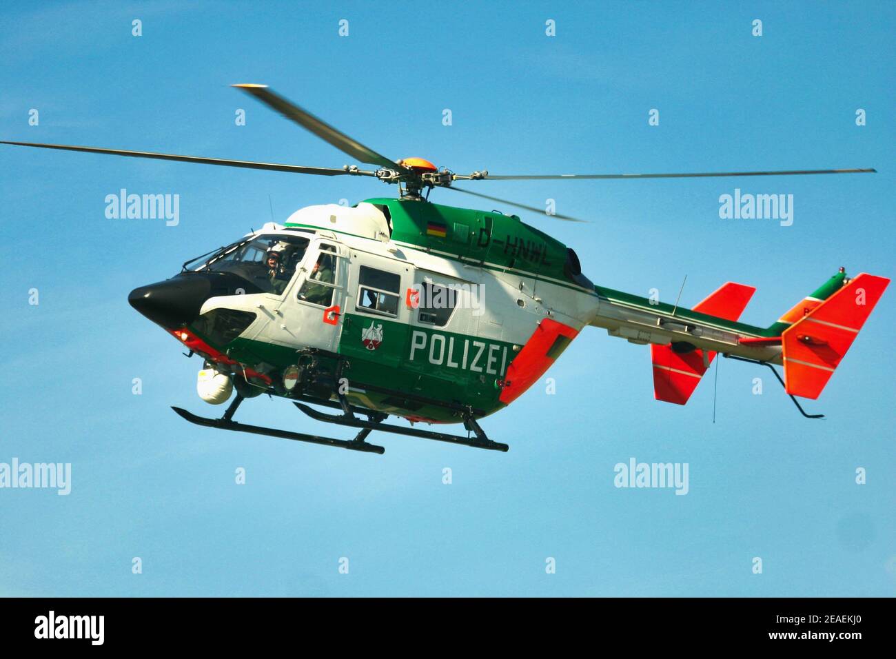 Police helicopter in action in the air Stock Photo - Alamy