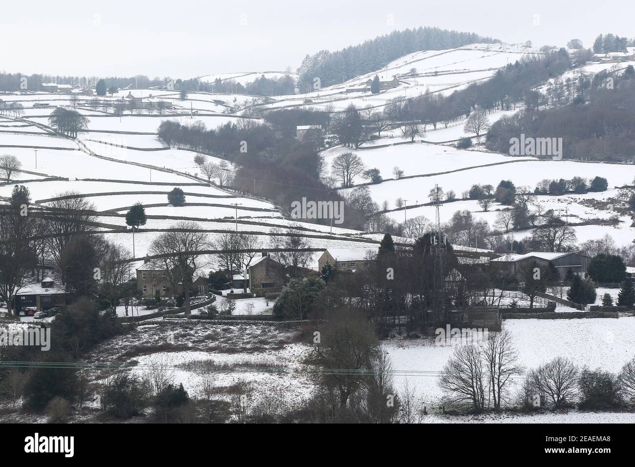 Snow covers the landscape surrounding the town of Holmfirth in West ...