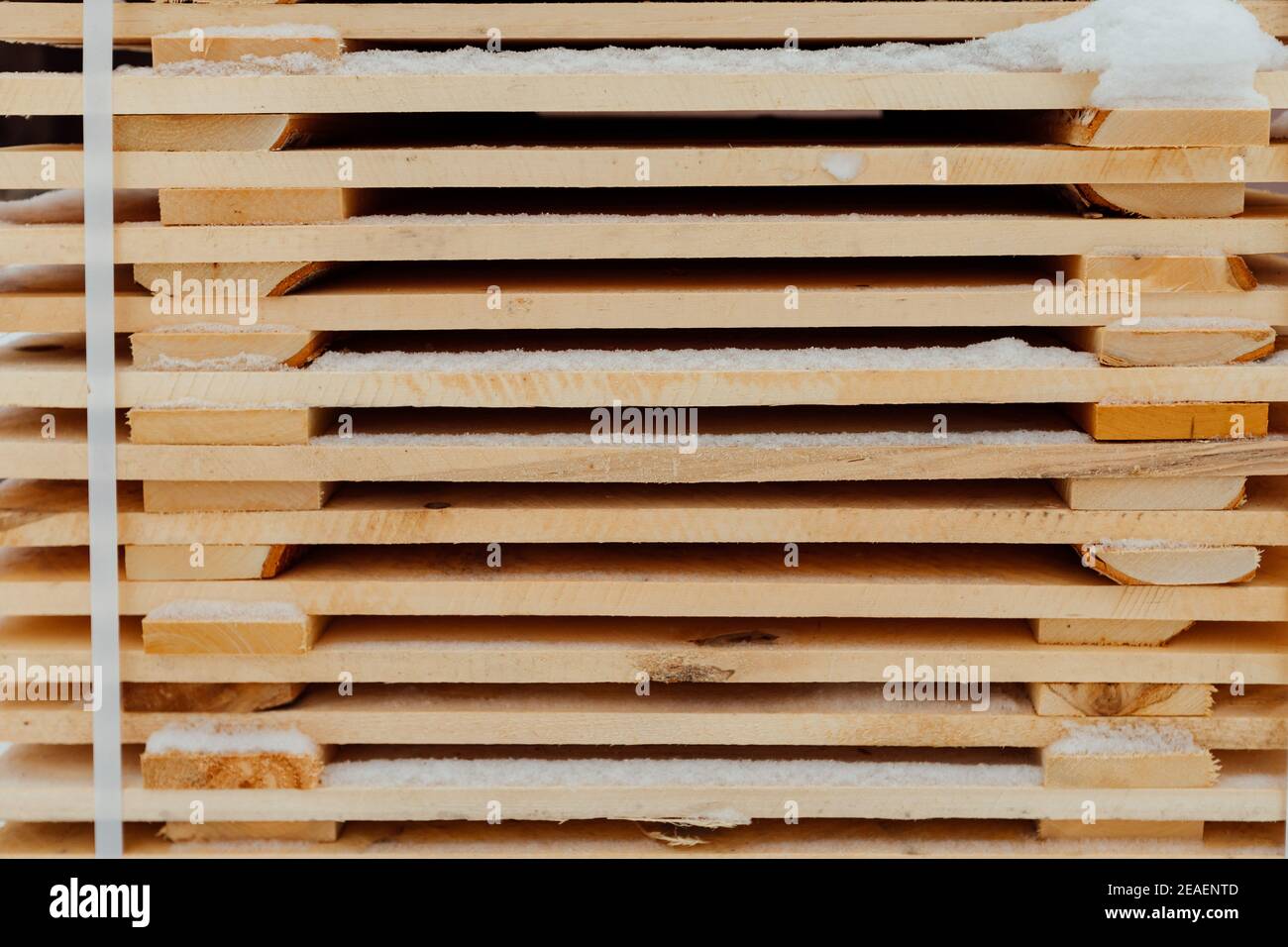warehouse of wooden boards, background texture of wood harvested for ...