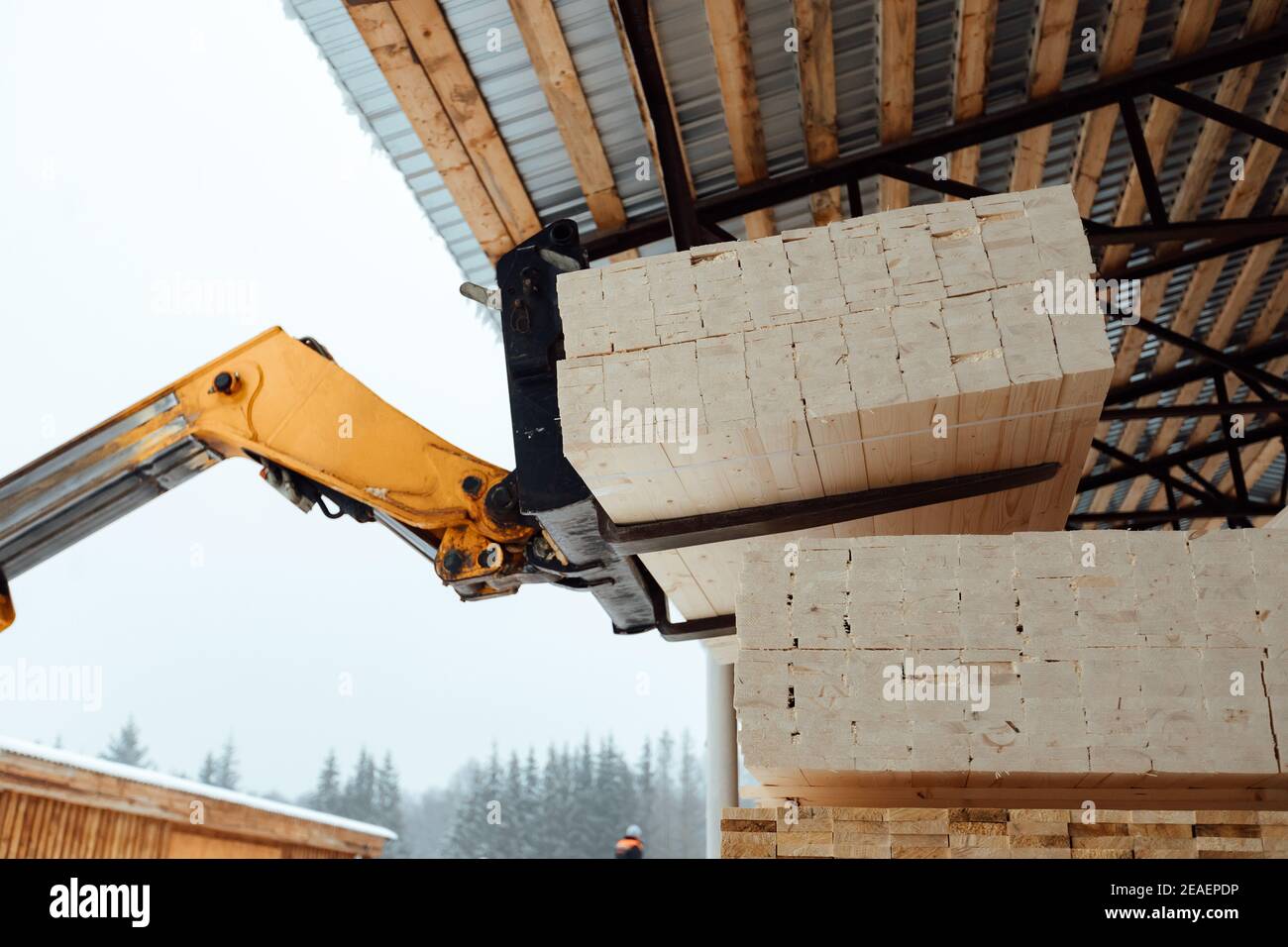 forklift truck with planks, delivery of wood to the warehouse, loading ...