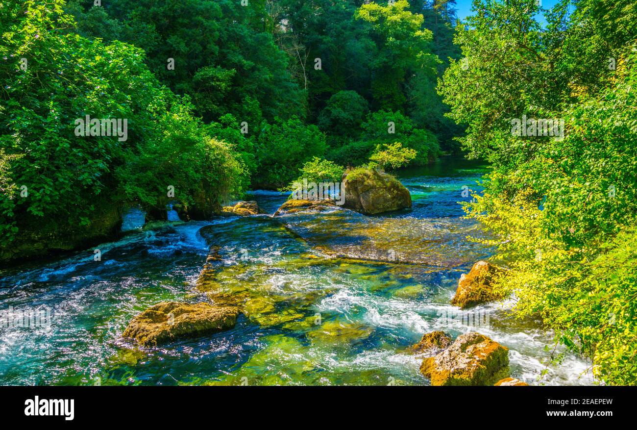 La sorgue river passing through Fontaine de Vaucluse village in France ...