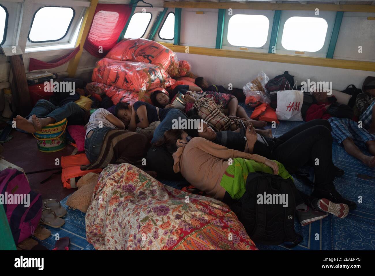 Polilio, Philippines - May 1, 2017: sleeping Filipino ferry pessengers ...
