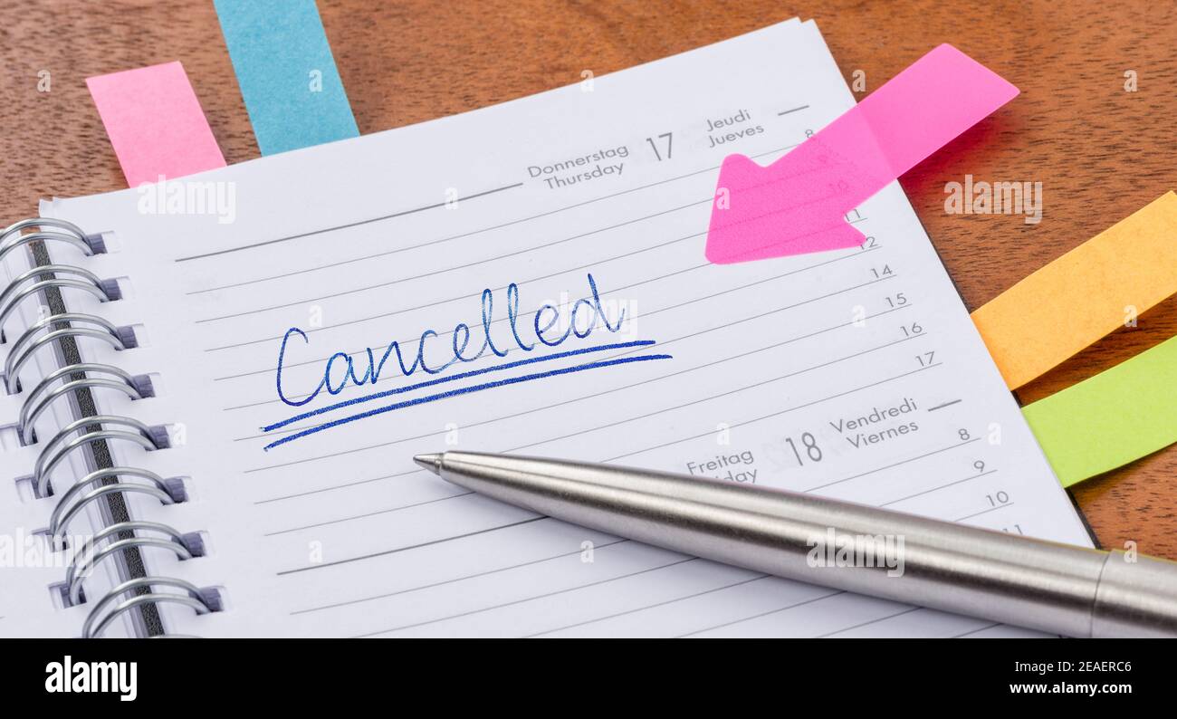 Daily planner with the entry Cancelled Stock Photo - Alamy