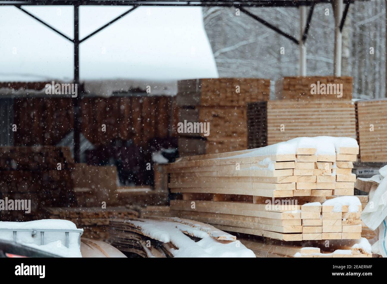 warehouse of wooden boards, background texture of wood harvested for ...