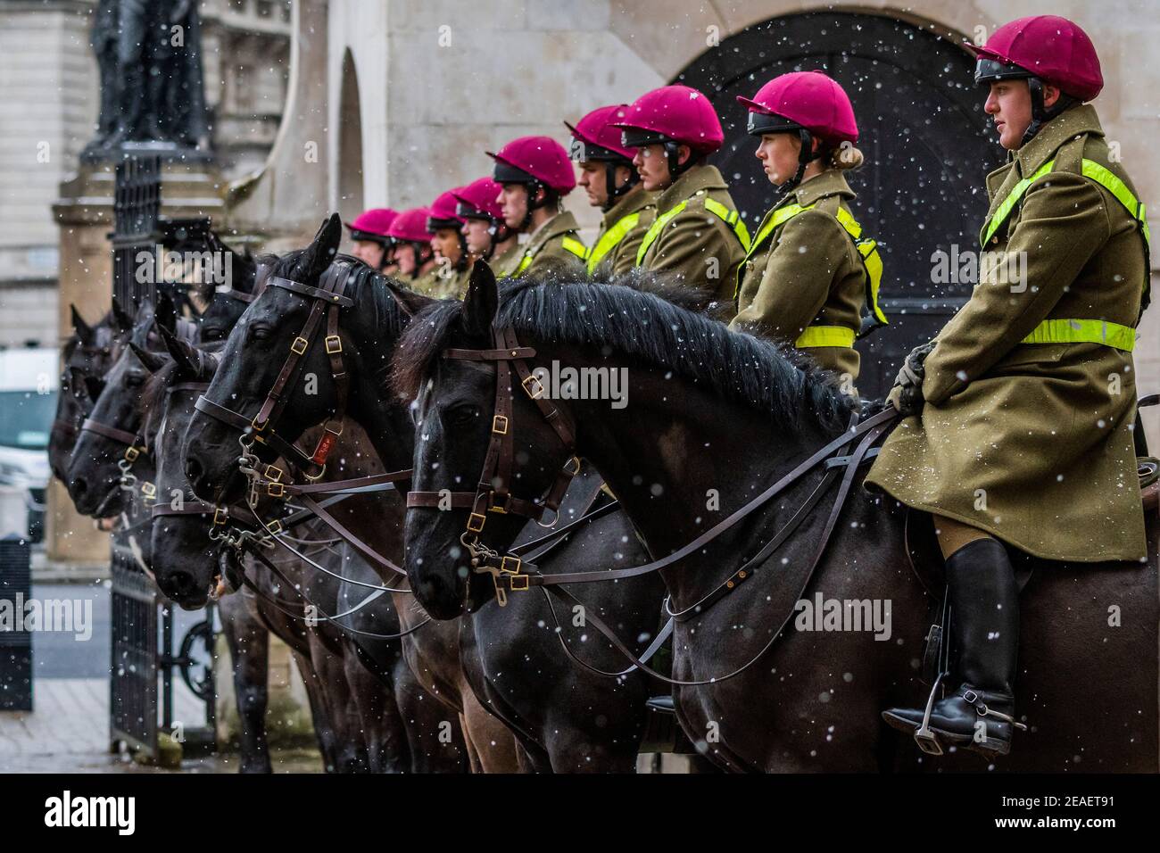 London, UK. 9th Feb, 2021. The mounted Life Guards arrive to change the ...