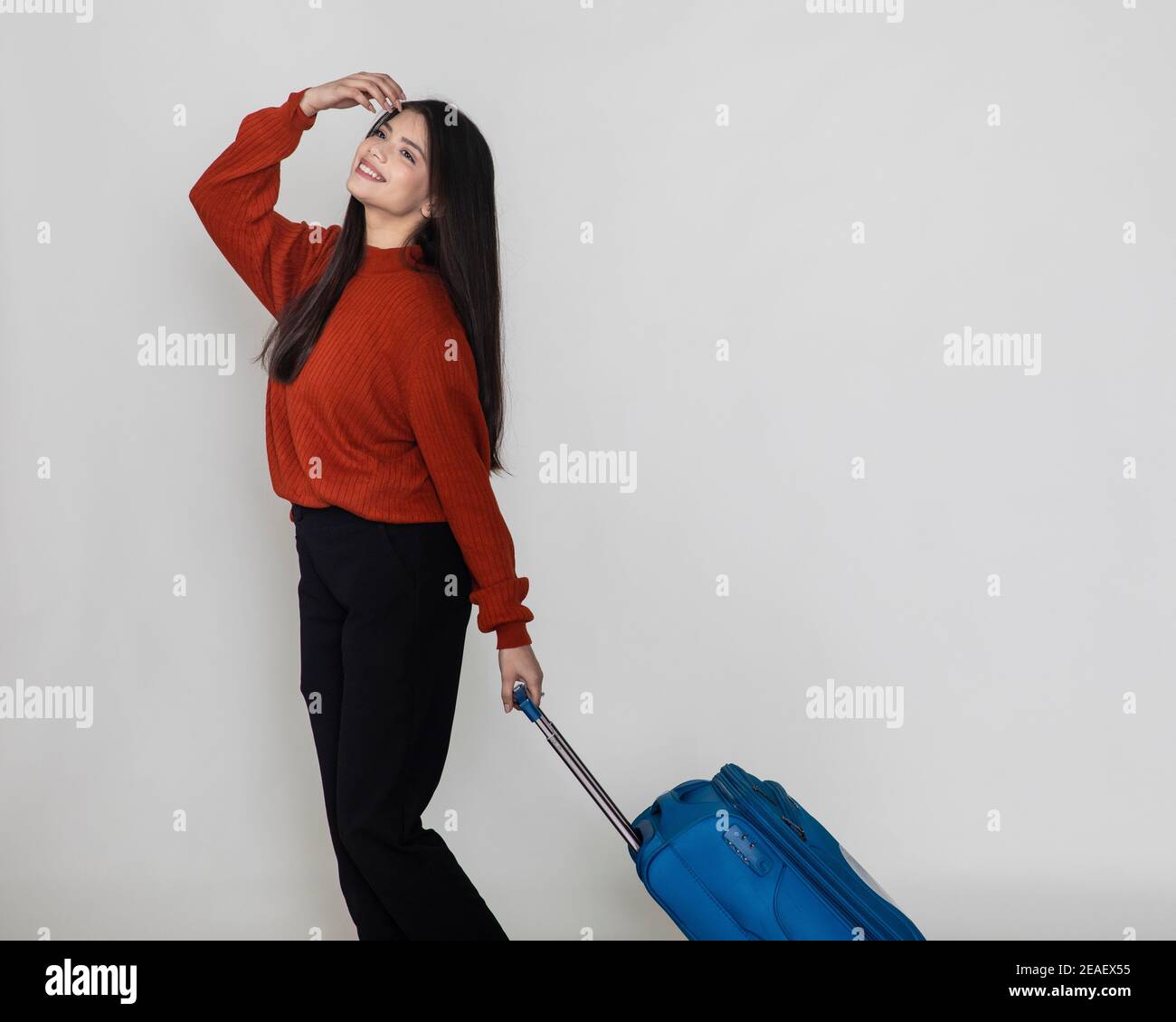 Pulling trolley bag hi-res stock photography and images - Alamy