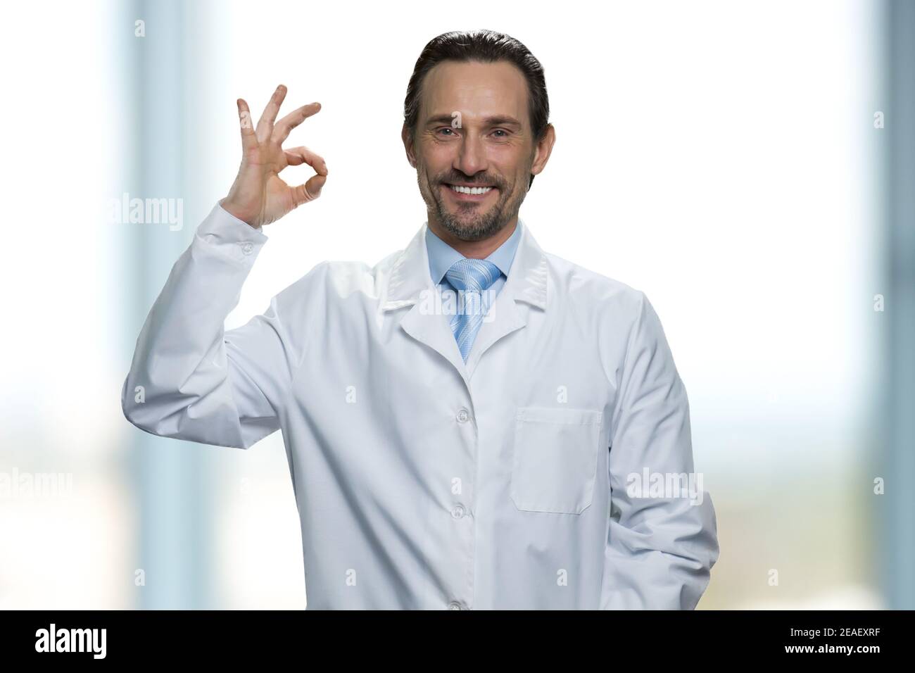 Portrait positive male doctor showing hi-res stock photography and ...
