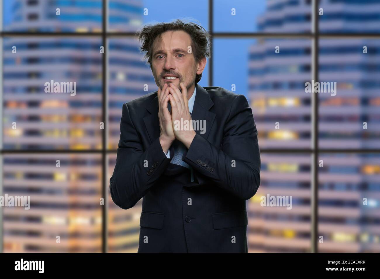 Stressed and dissapointed businessman in a tv studio Stock Photo - Alamy