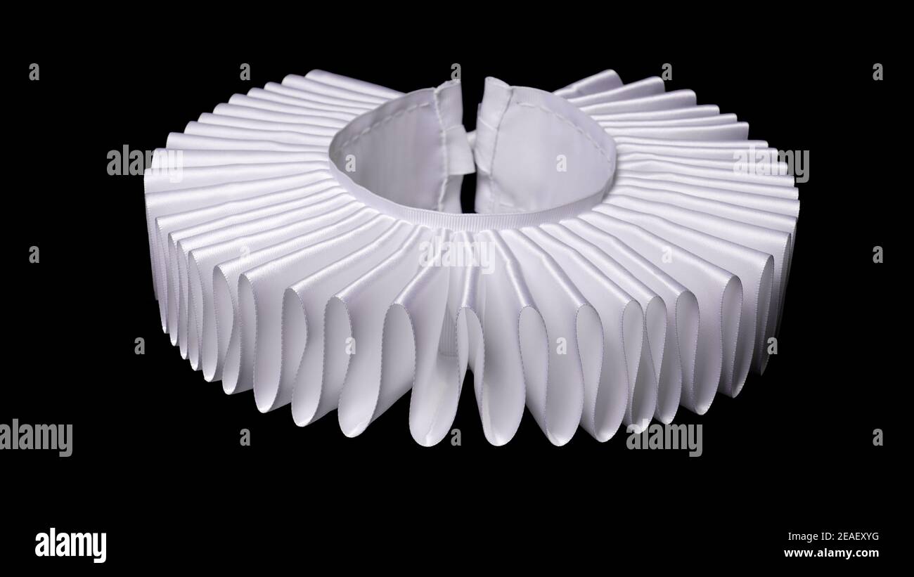 white ruff or ruffled or millstone collar isolated on black background ...