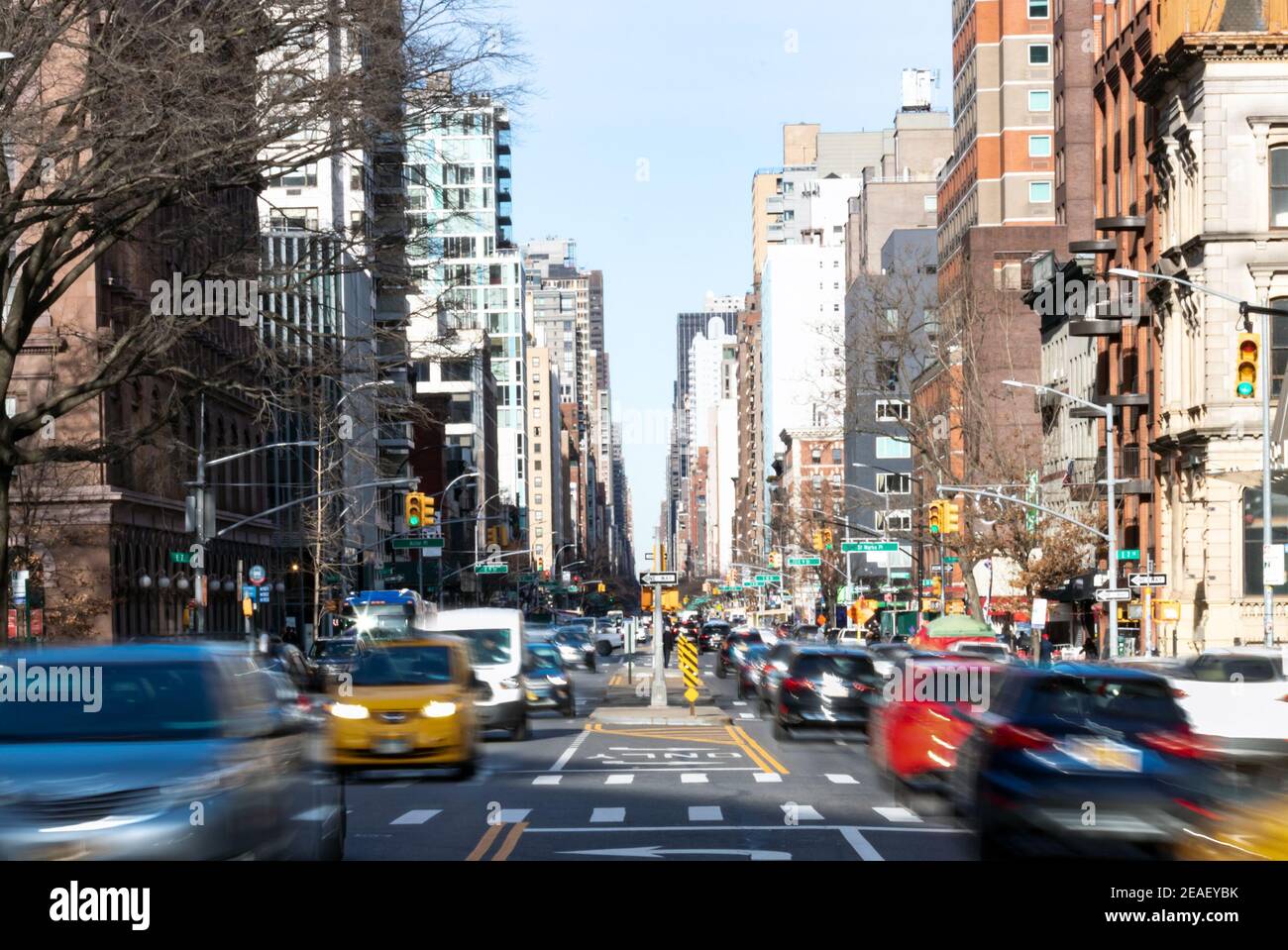 Cars and taxis driving through the intersections along 3rd Avenue in ...
