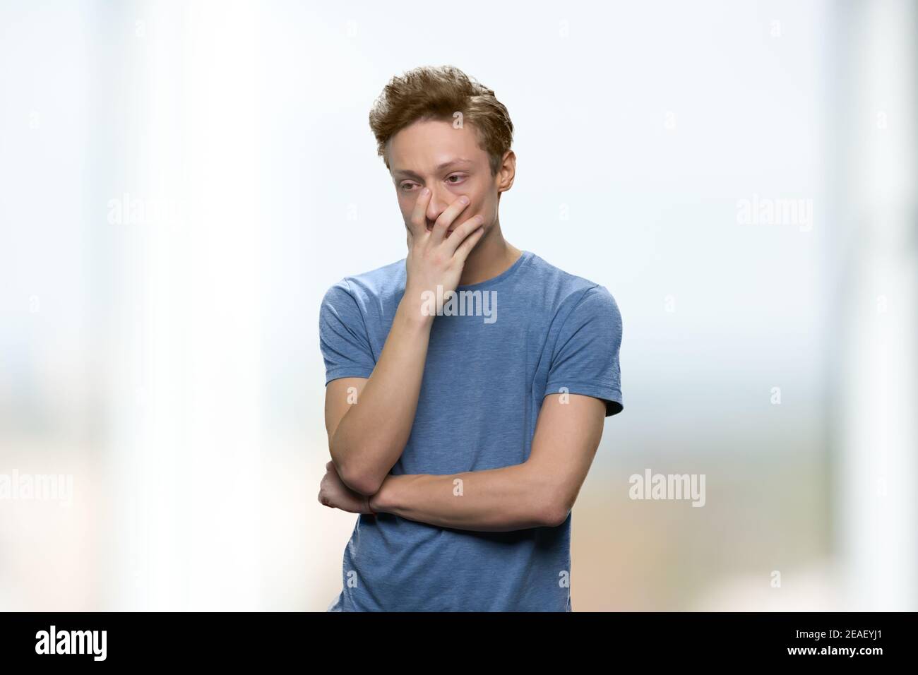 Tired exhausted boy Stock Photo - Alamy