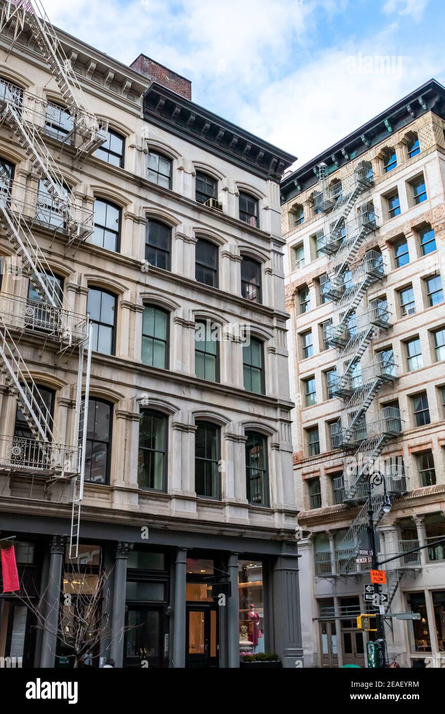 Old apartment buildings with windows and fire escapes in the SoHo ...