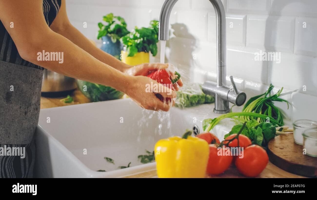 Close Up Shot of a Man Washing Tomatoes with Tap Water. Authentic ...