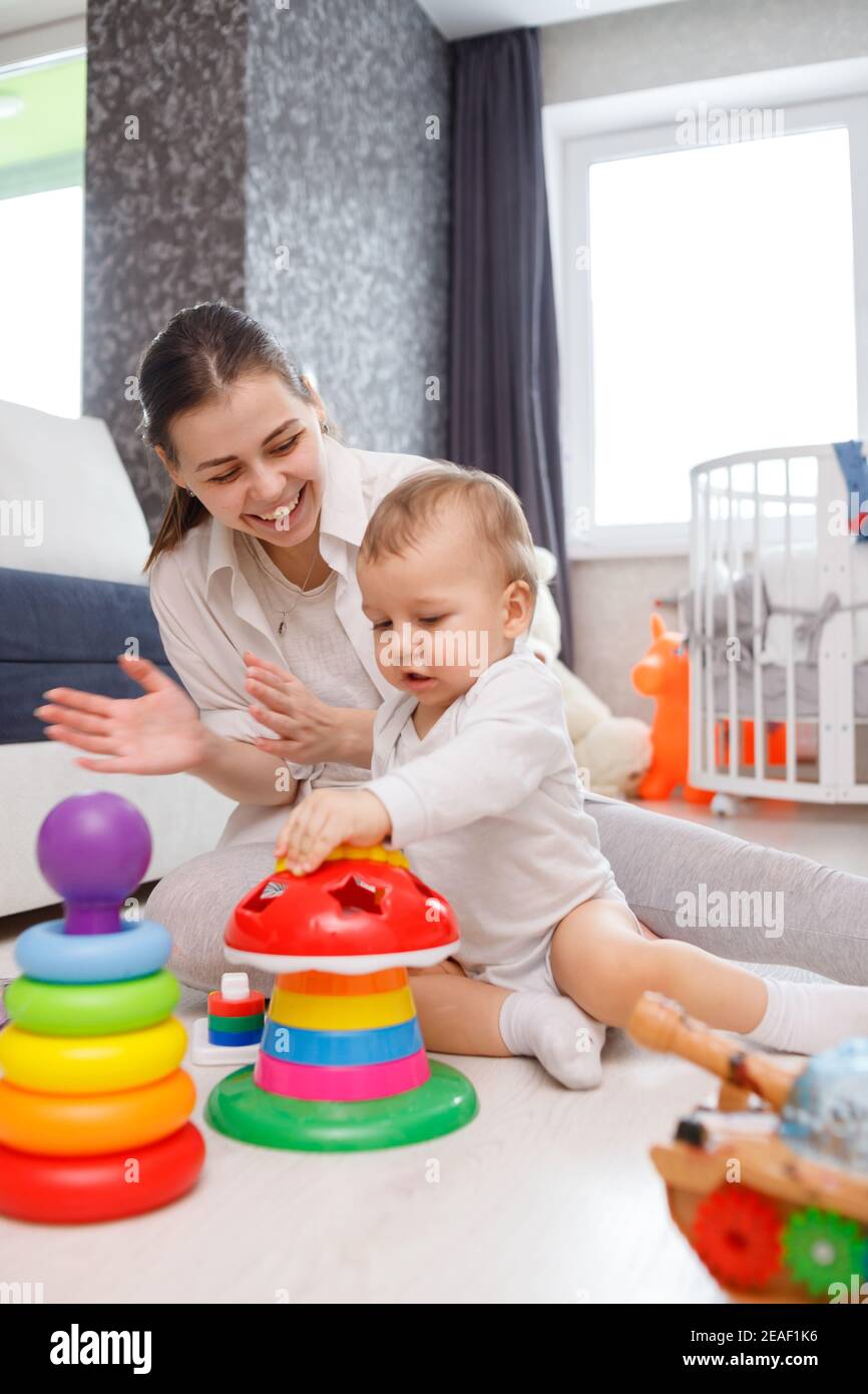 Cute baby playing hi-res stock photography and images - Alamy