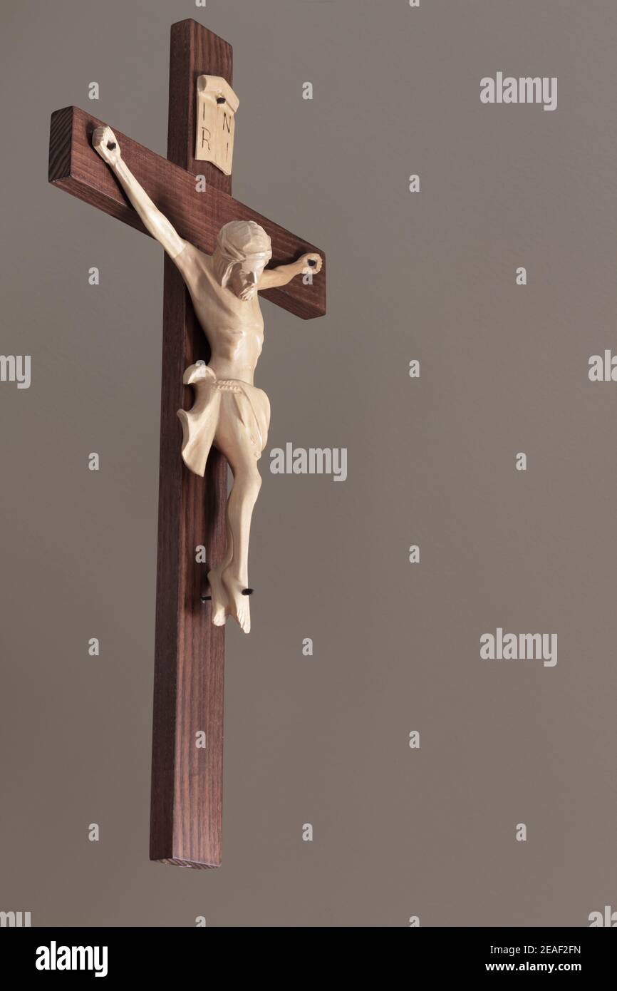 wood crucifix cross of Jesus Christ from side with copy space Stock ...