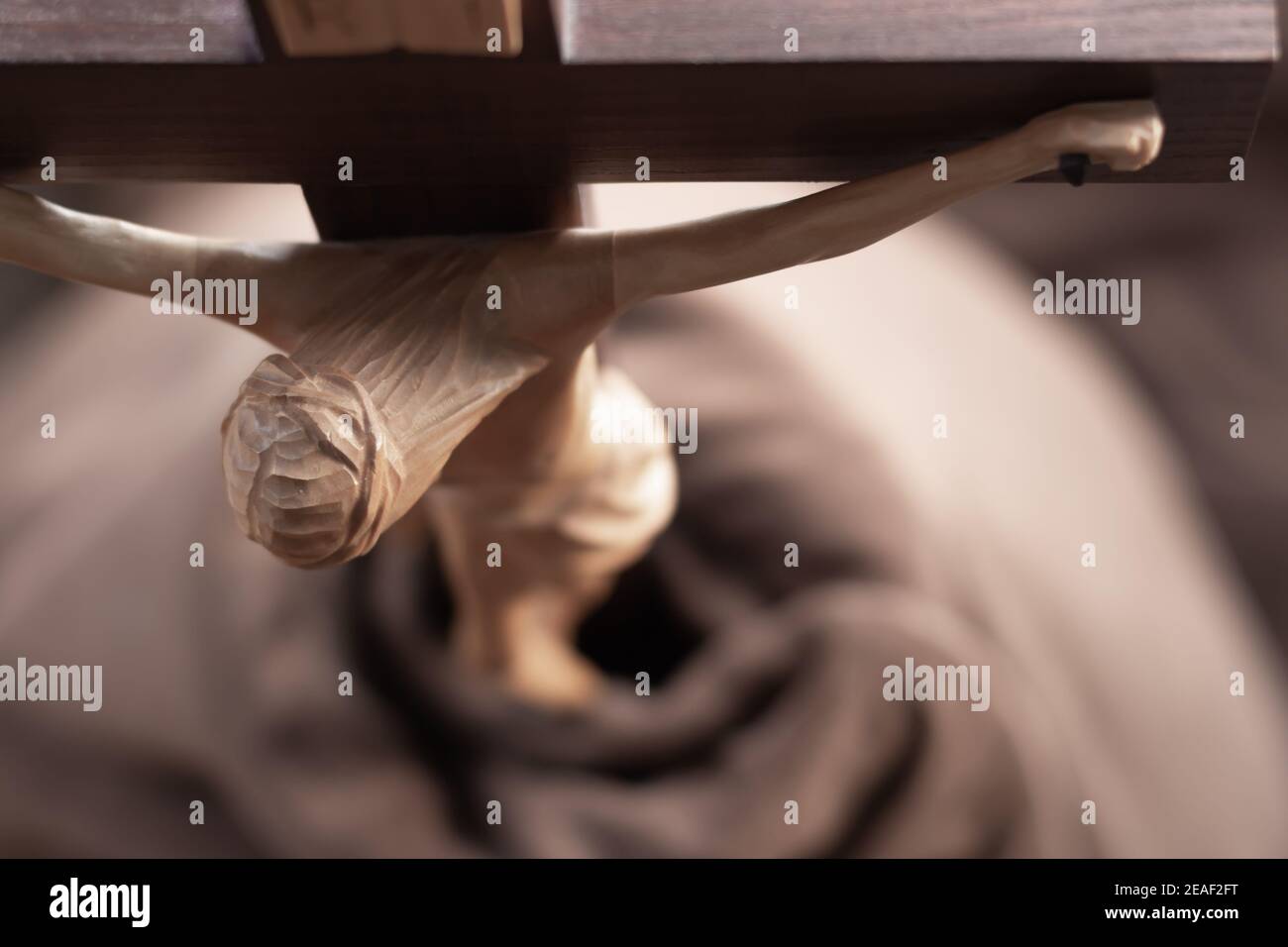 wood crucifix cross of Jesus from above with copy space Stock Photo - Alamy
