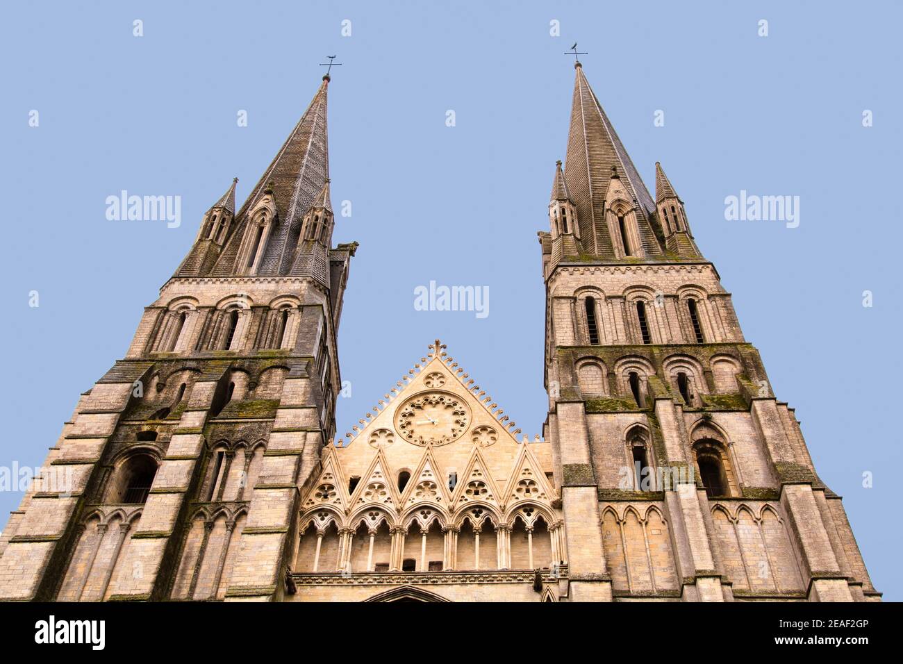 Low angle shot of the facade of Bayeux Cathedral with towers in ...