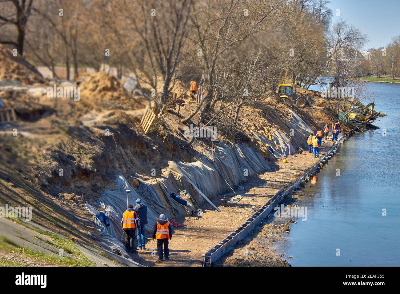 Cleaning of lakes by workers and reconstruction of the park area Stock ...