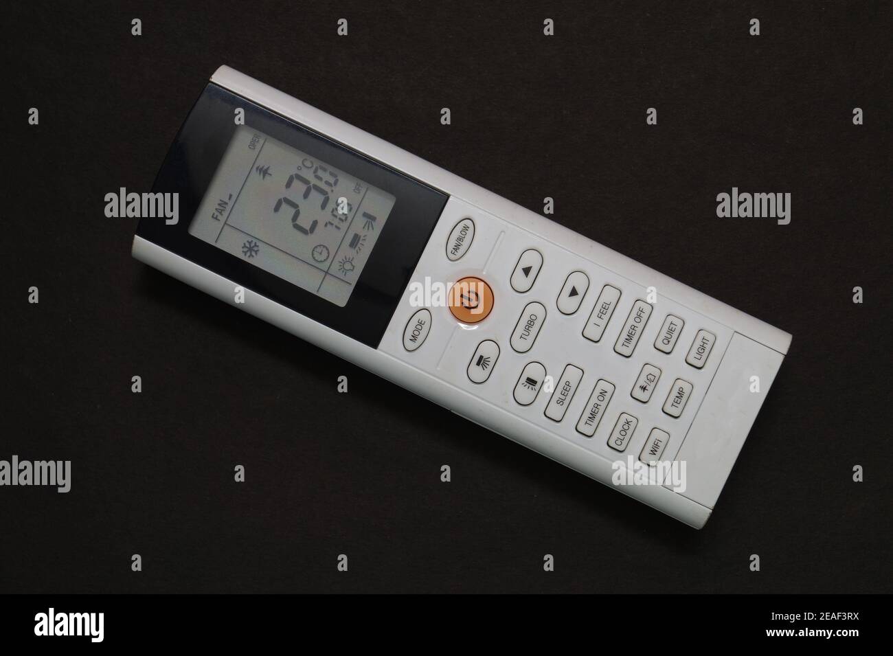 Remote of Air conditioner in a dark background Stock Photo - Alamy