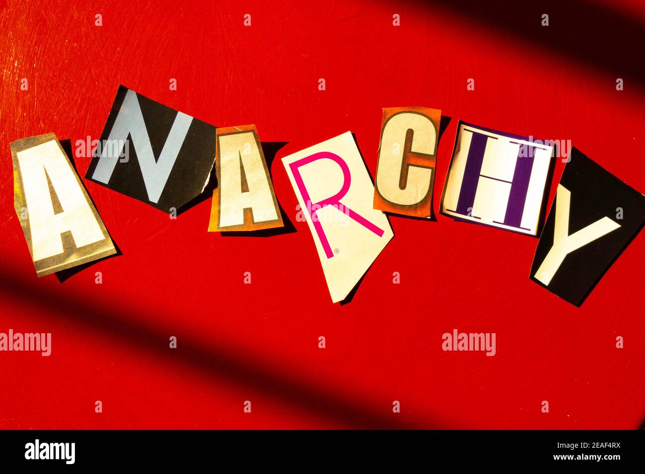 The Word "ANARCHY" using cut-out paper letters in the ransom note ...