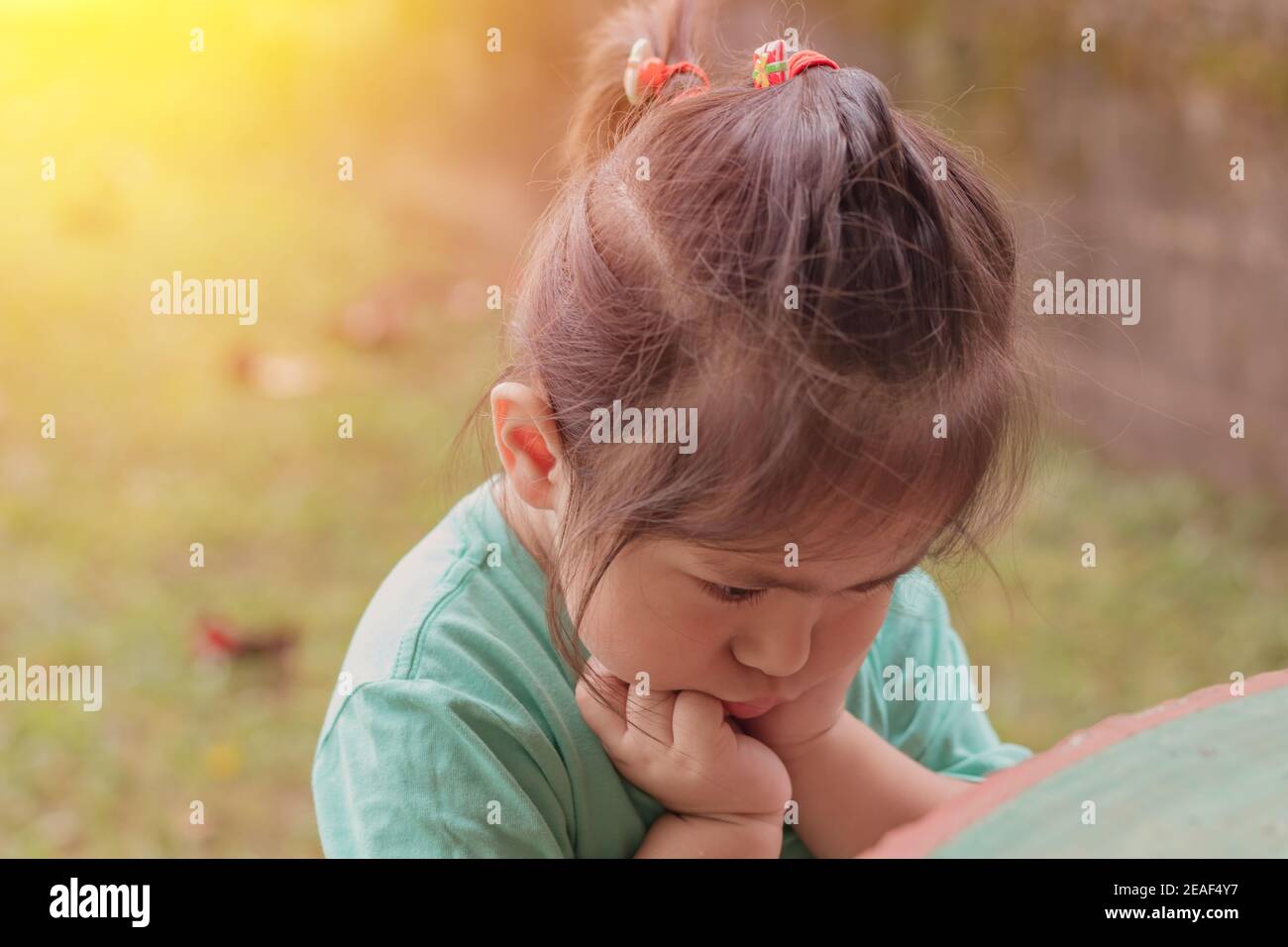 Close-up of an Asian kid girl frustrating and crying and sad.She has a ...
