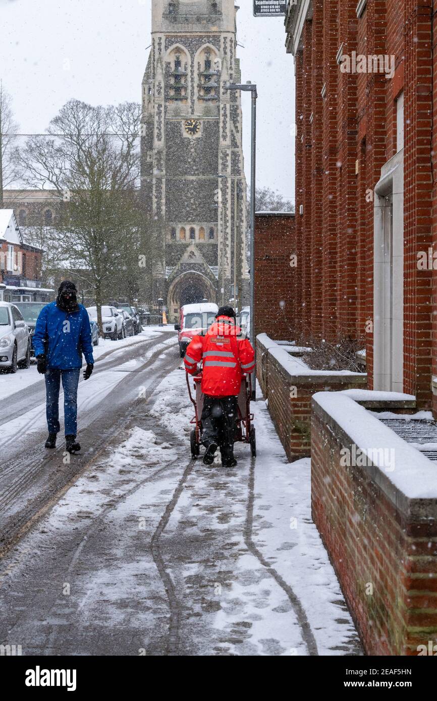Brentwood Essex 9th February 2021 Weather: Storm Darcy. Postman returns ...
