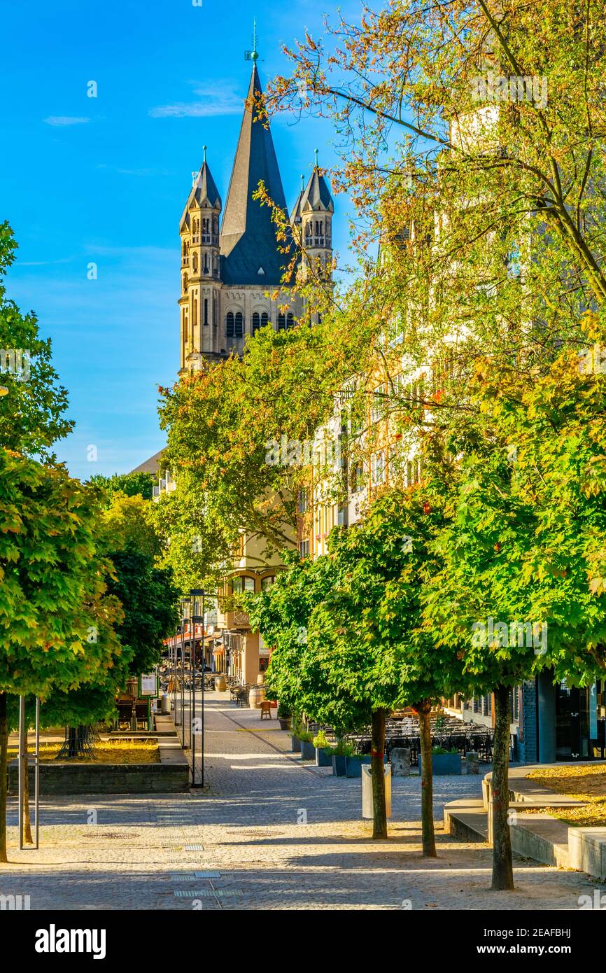 Riverside promenade and Saint Martin church in Cologne, Germany Stock ...