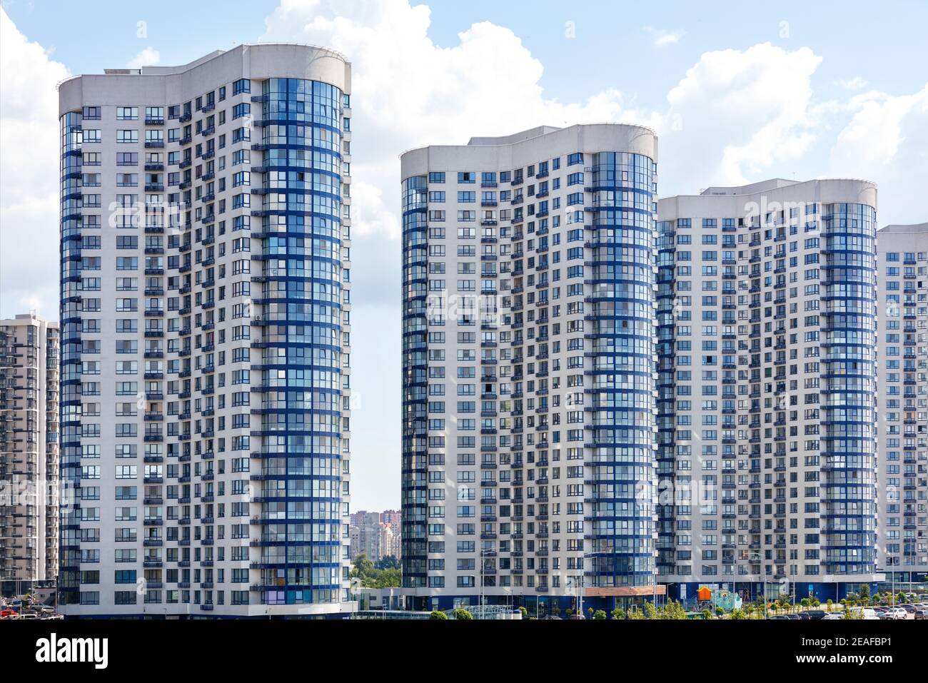 The elegant blue and white facades of new multi-storey buildings ...
