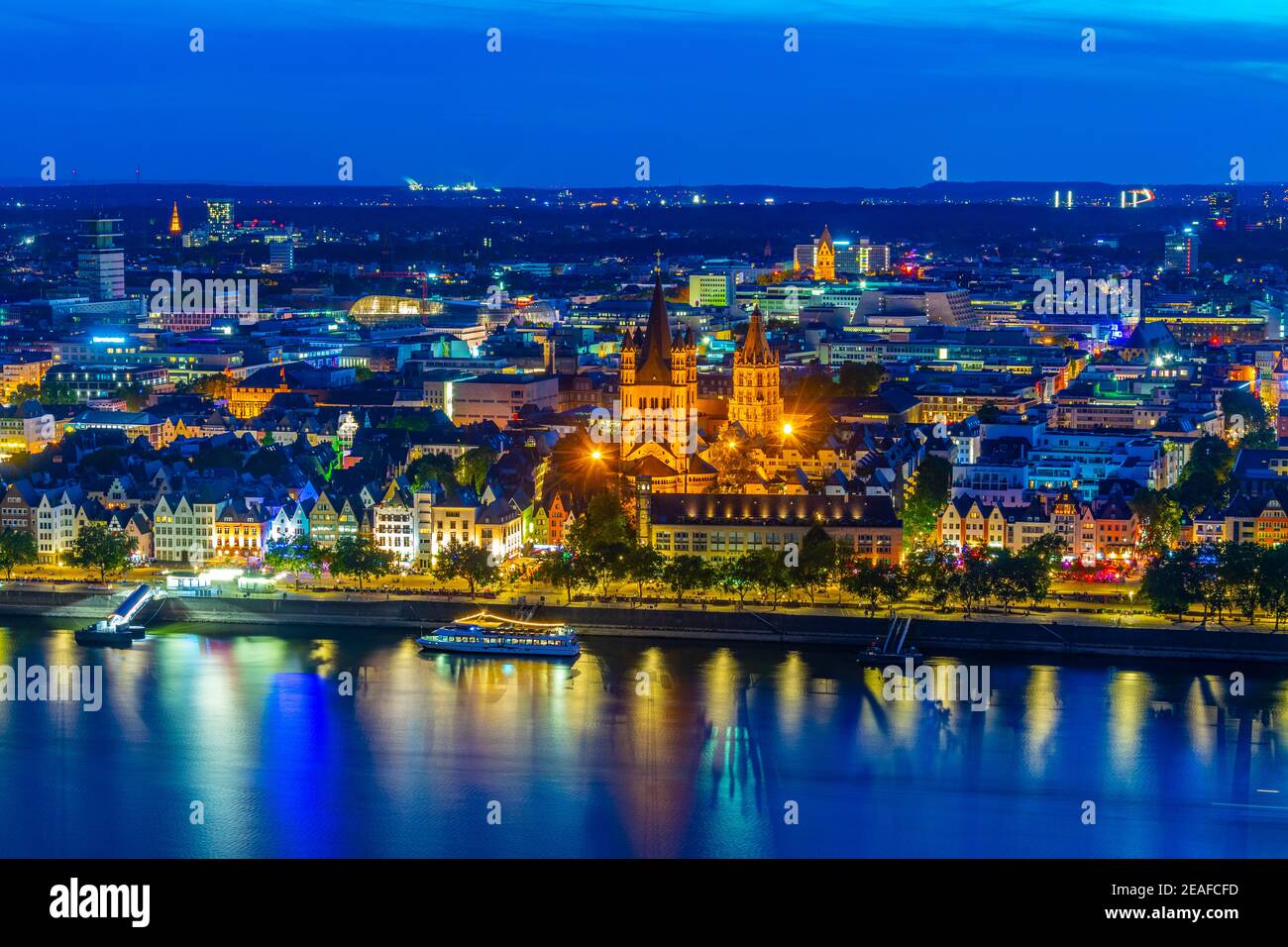 Night aerial view of the riverside promenade and Saint Martin church in ...