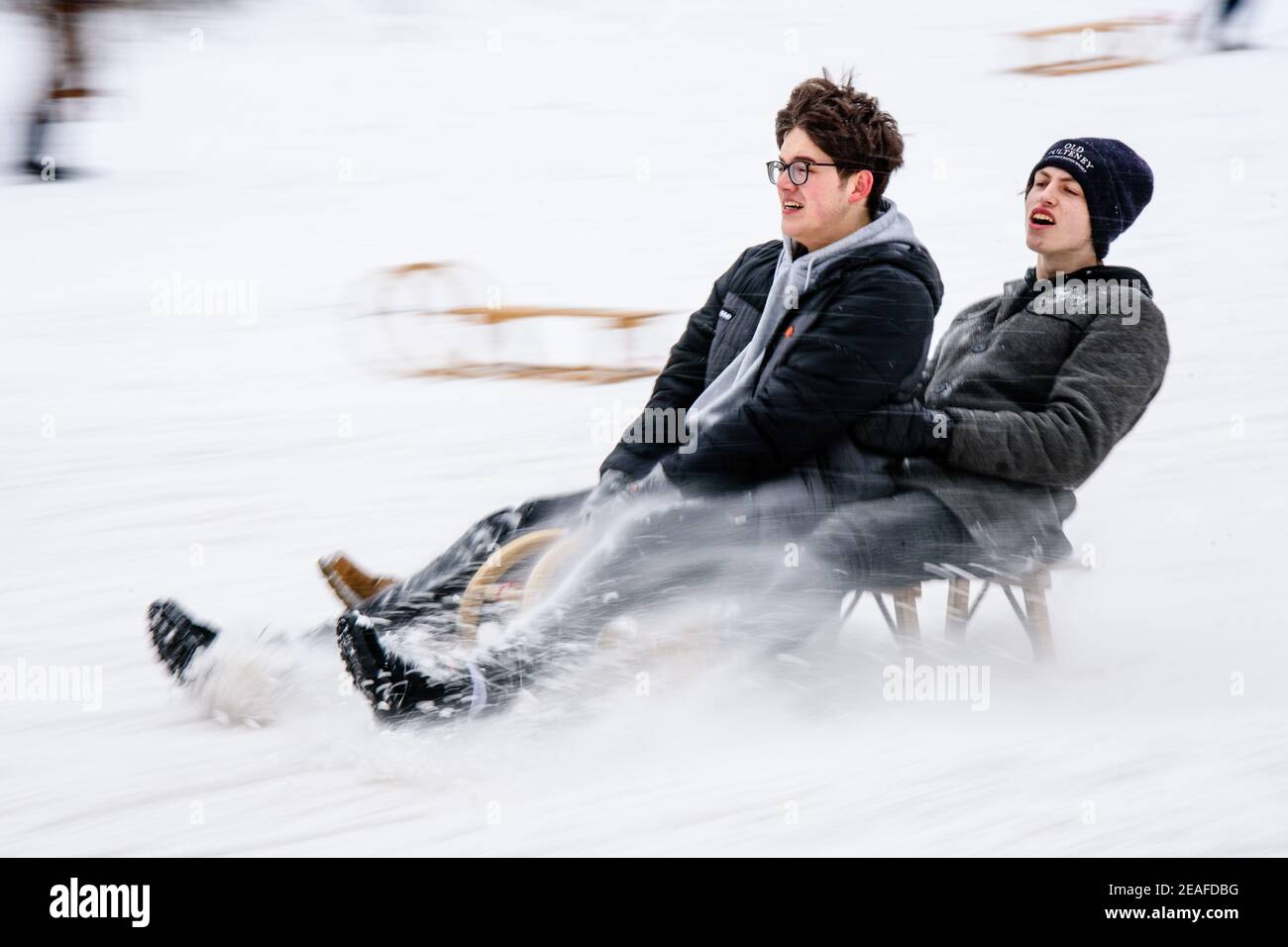 Berlin, Berlin, Germany. 9th Feb, 2021. Two persons sled on a slope at ...