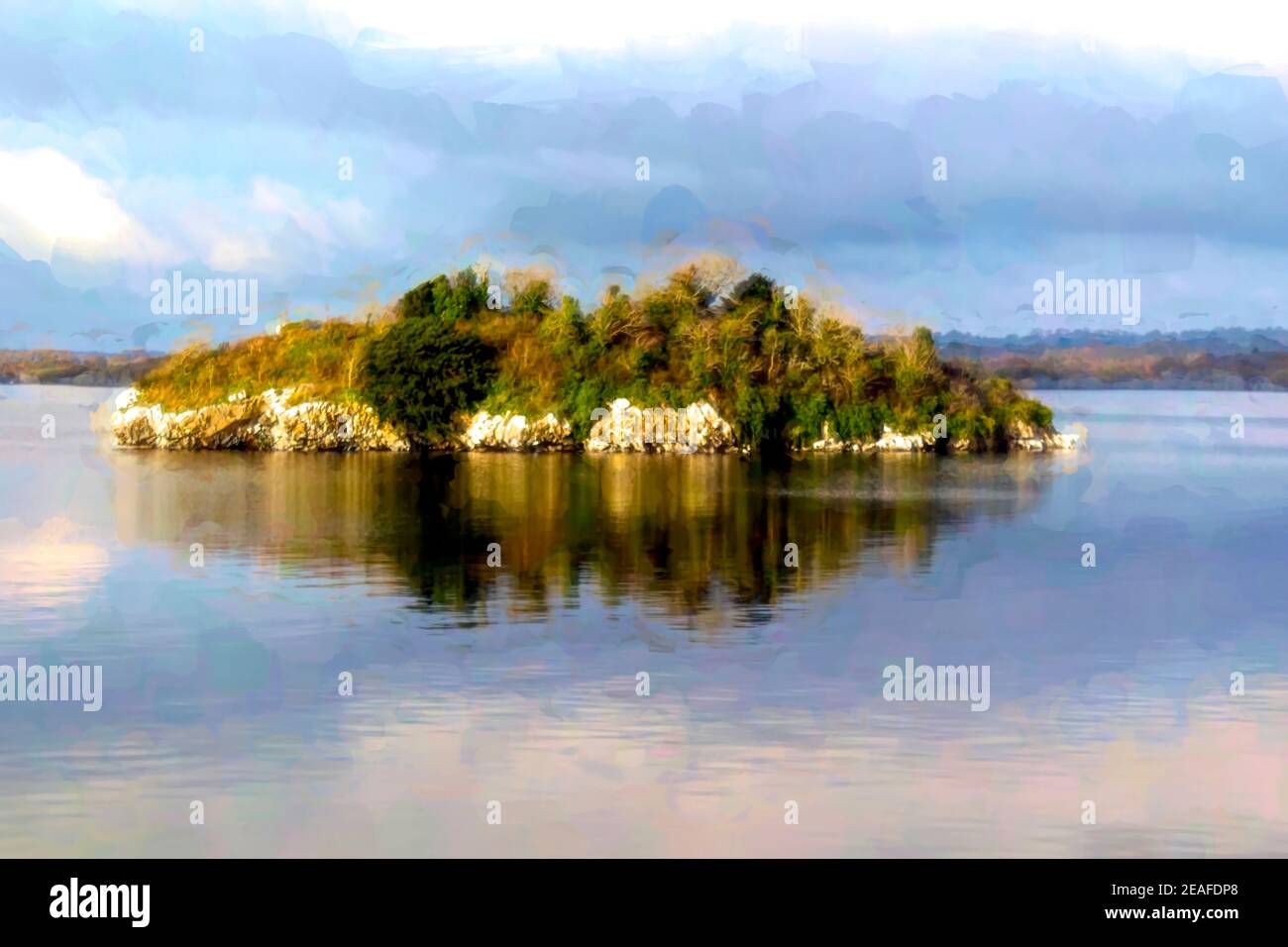 A limestone islet on the lake covered with lush vegetation Stock Photo ...
