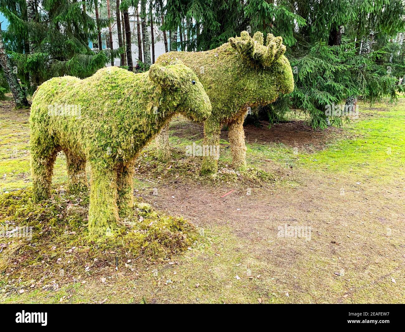 Sculptures of animals in forest from natural materials Stock Photo - Alamy