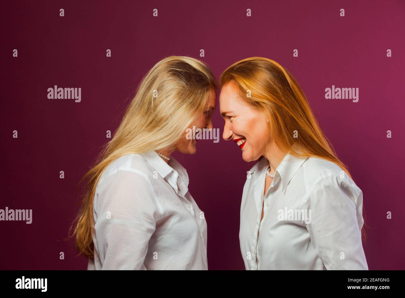 Two people standing opposite each other hi-res stock photography and ...